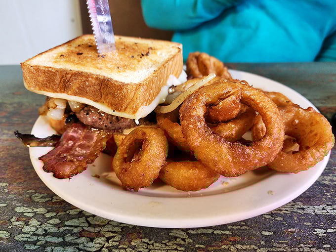 The patty melt here doesn't just melt cheese &ndash; it melts hearts with those perfectly crisped edges and gooey center.