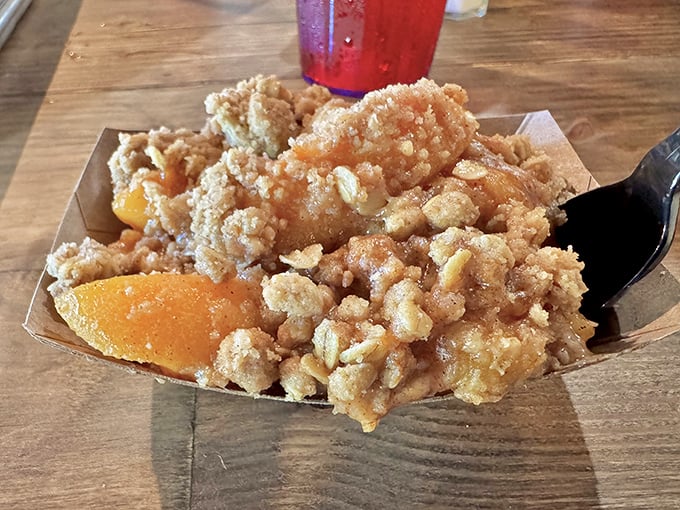 This peach cobbler doesn't just have a golden crust&mdash;it has the kind of crumble topping that makes you forget your table manners.