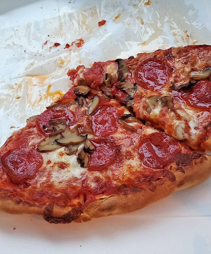 Those pepperoni cups holding tiny pools of flavor are what separate good pizza from the kind you tell your friends about.