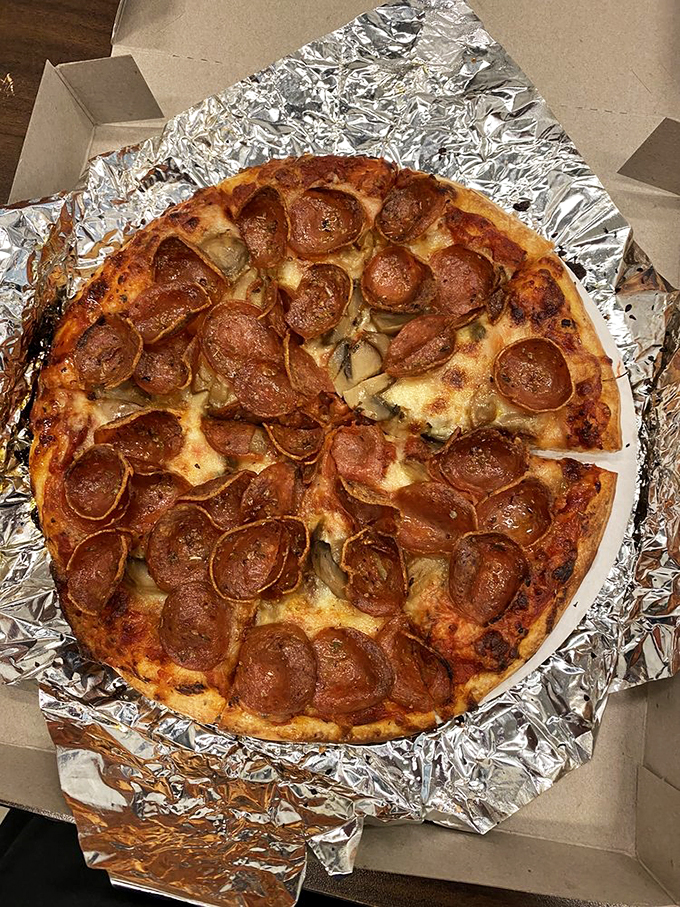 When pepperoni and mushrooms join forces, magic happens. Like Batman and Robin, if they were delicious and didn't fight crime but instead fought hunger.