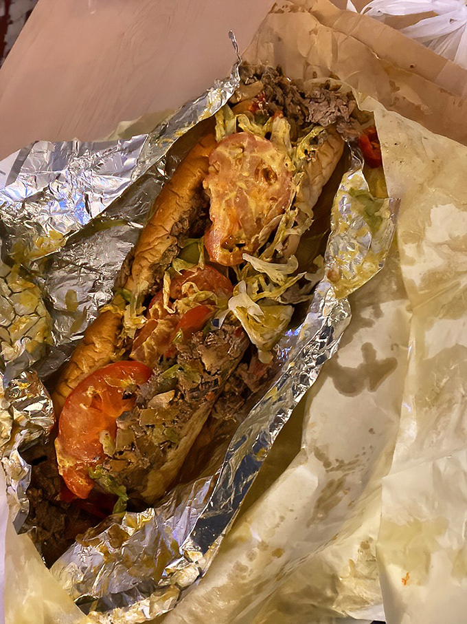 When meat and bread achieve perfect harmony, angels sing. This cheesesteak with peppers and onions is Philadelphia's greatest love story.