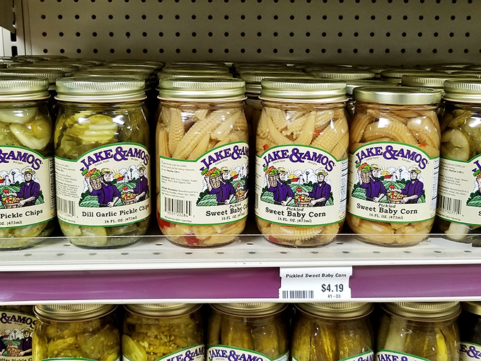 Mason jars lined up like soldiers, protecting pickled treasures that transform ordinary sandwiches into memorable meals.