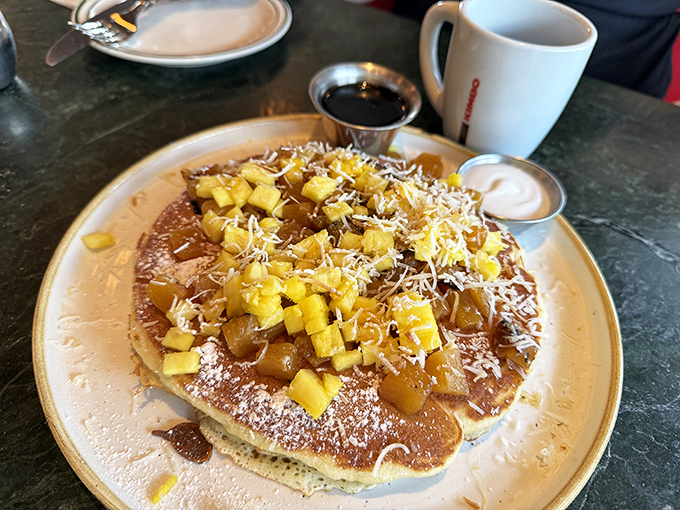 Piña Colada Pancakes that bring vacation vibes to breakfast. Like a tropical getaway that doesn't require TSA screening.