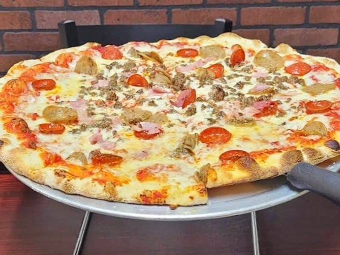 Pizza that would make an Italian grandmother nod in approval. The perfect balance of cheese, toppings, and a crust that deserves its own fan club.