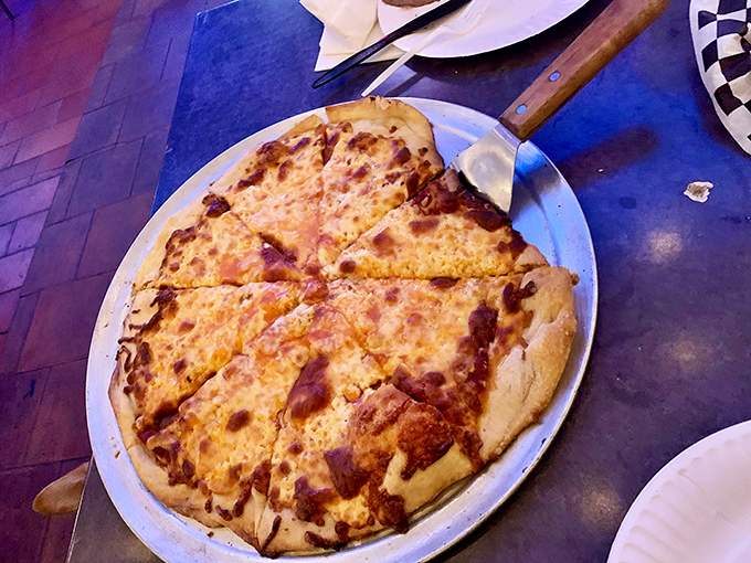 Pizza that doesn't try to be Neapolitan, New York, or Chicago&mdash;just honest neighborhood pie with a golden cheese-to-crust ratio that works.