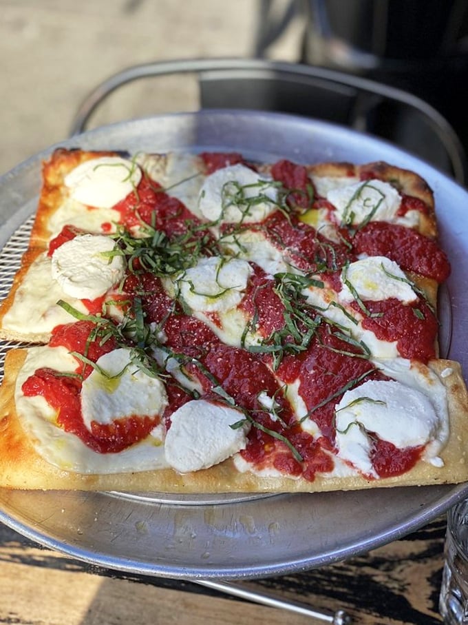 The Margherita reimagined as a rectangle&mdash;proof that great pizza doesn't need to fit inside traditional circular boundaries.