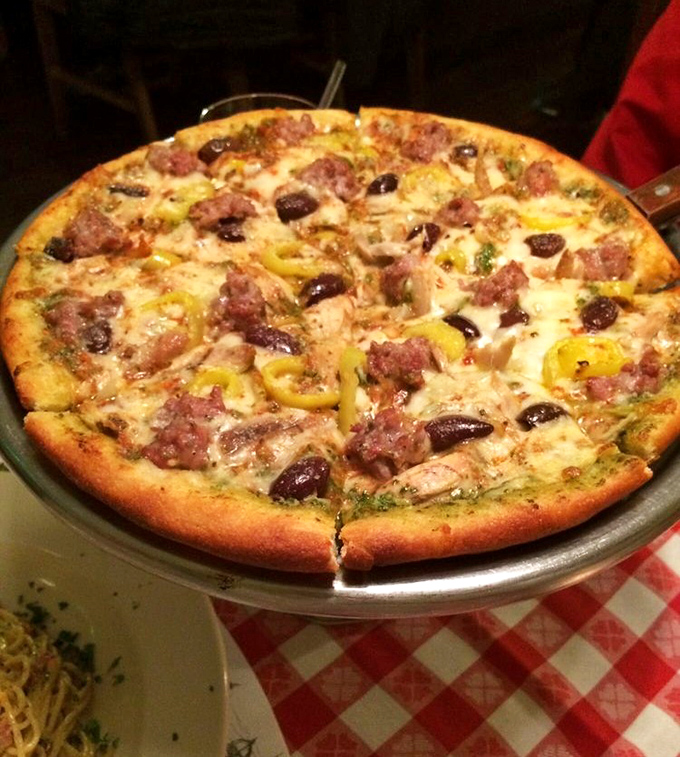 Pizza that makes you question why you ever settled for delivery&mdash;topped with Italian sausage, banana peppers, and olives that actually taste like olives.