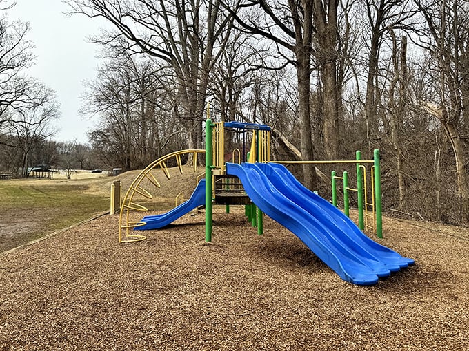 Remember when playground equipment was just metal death traps in the sun? This modern play area keeps the fun while skipping the third-degree burns.