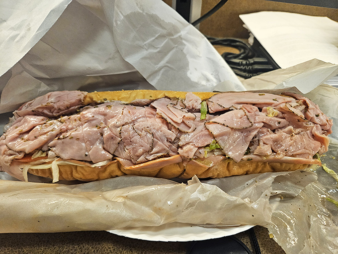 A ham sandwich so generous it should come with its own payment plan. This isn't lunch&mdash;it's a commitment to excellence.