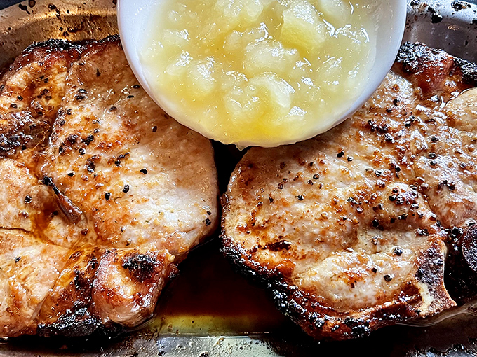 Pork chops seared to perfection with applesauce on standby. When chicken gets jealous of another menu item, you know it's something special.