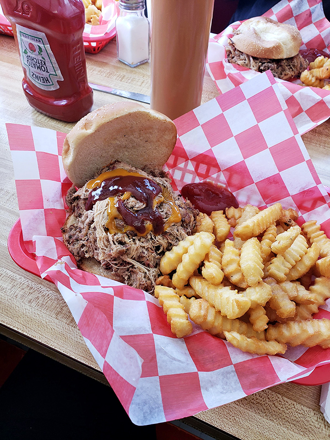 When pulled pork meets crinkle-cut fries, it's not just a meal—it's a match made in BBQ heaven that demands both napkins and respect.