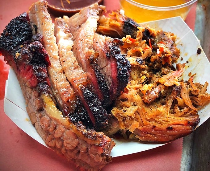 The pork shoulder and brisket plate: where smoke meets meat in a romance so perfect it should be a Netflix special.