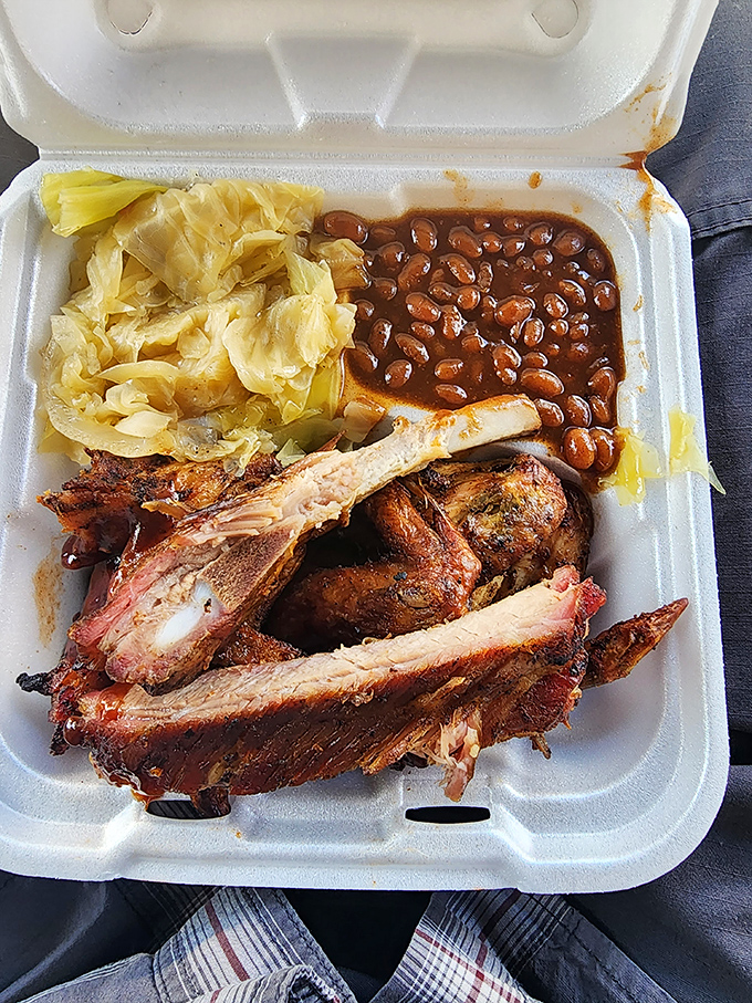The classic BBQ combo plate: where decisions are hard but regrets are impossible. Those beans and greens aren't just sides&mdash;they're essential supporting characters.