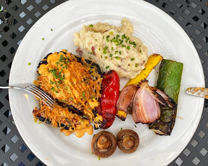 A feast for the eyes and palate&mdash;grilled portabella mushroom alongside colorful roasted vegetables and creamy mashed potatoes that comfort the soul.