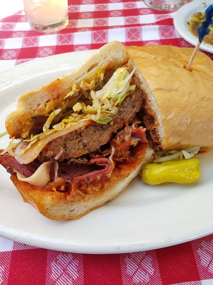 This sandwich looks like it bench-pressed its way onto the plate - pure deli muscle between bread.