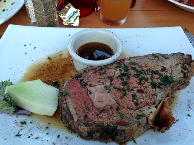 Prime rib so perfectly pink it makes you want to write poetry. The au jus cup isn't optional&mdash;it's essential life support for this meaty masterpiece.