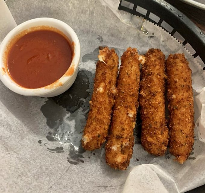 Provolone sticks: where cheese meets crunch in perfect harmony. Dunk these golden beauties in that vibrant marinara and prepare for bliss.