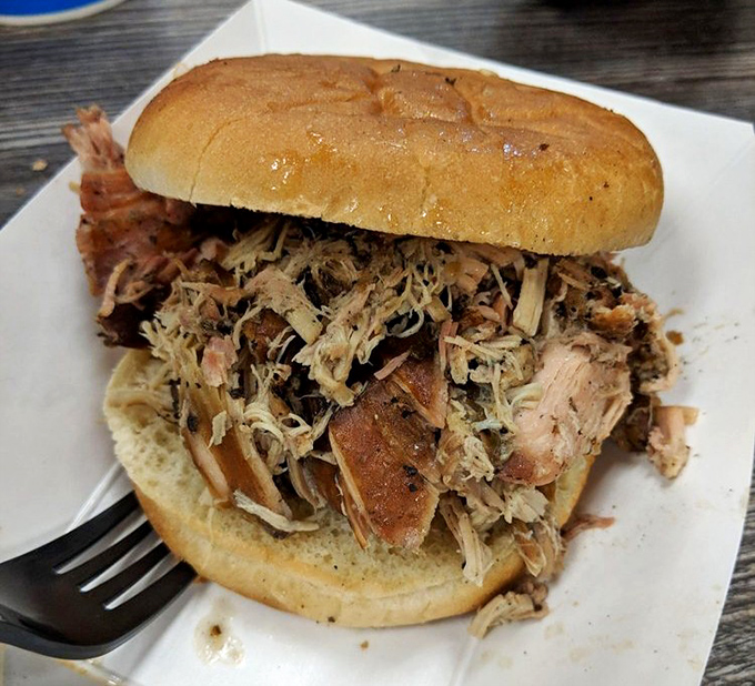 A pulled chicken sandwich that puts ordinary lunch options to shame. Fluffy bun, mountain of meat&mdash;lunch of champions.