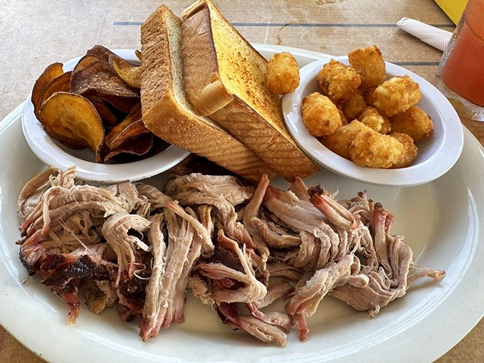 Pulled pork so tender it practically pulled itself. Served with Texas toast, corn nuggets and sweet potato chips&mdash;a holy trinity of Southern comfort.