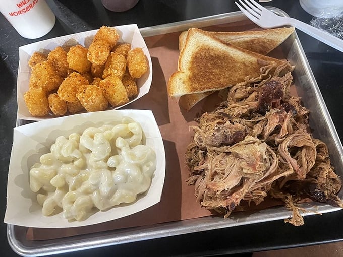 A barbecue trinity: pulled pork, mac and cheese, and tater tots. Some might call this comfort food&mdash;I call it the reason elastic waistbands were invented.