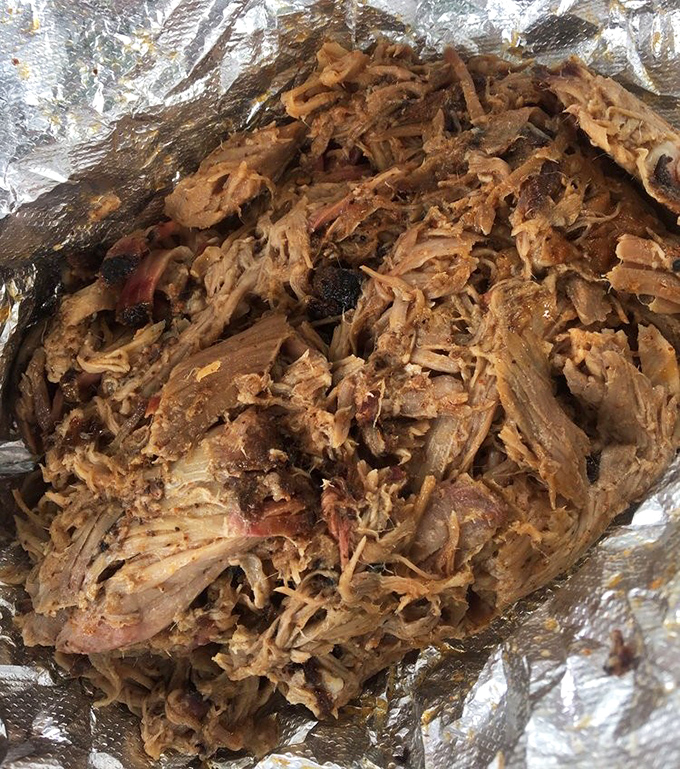 Pulled pork that actually stays pulled&mdash;not mushy, not dry, but that perfect sweet spot where smoke and moisture create textural harmony.