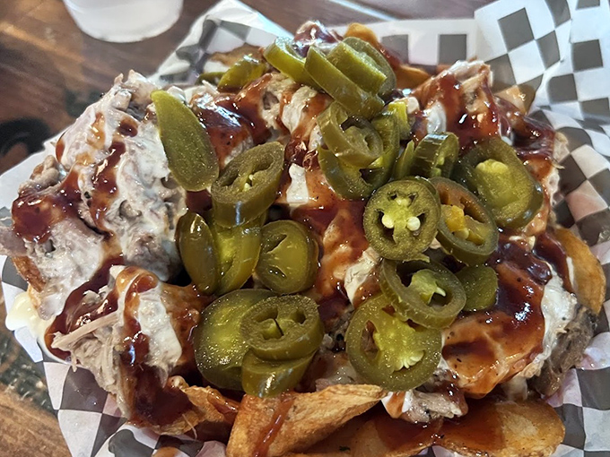 Nachos reimagined with pulled pork and jalape&ntilde;os&mdash;a Tennessee twist that makes traditional nachos seem like they've been underachieving their entire existence.