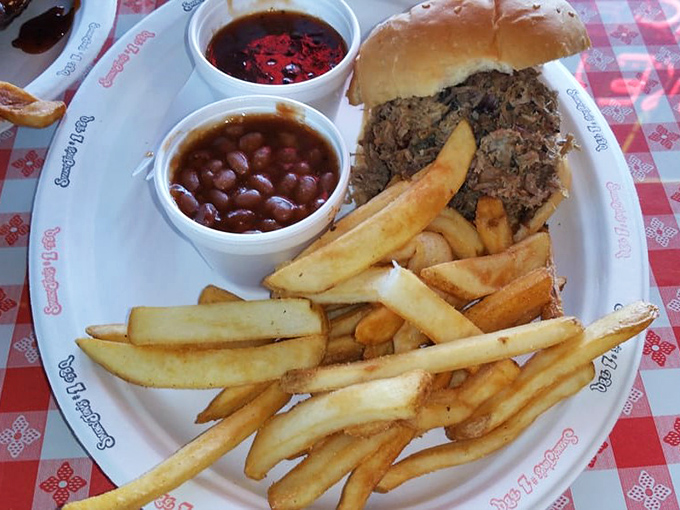 The pulled pork sandwich &ndash; where smoke-kissed meat meets soft bun in a relationship so perfect it should have its own reality show.