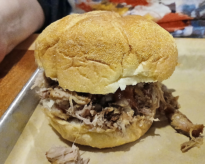 A pulled pork sandwich that doesn't need fancy garnishes to impress. Like a great actor, it knows its strength is in the performance, not the costume.