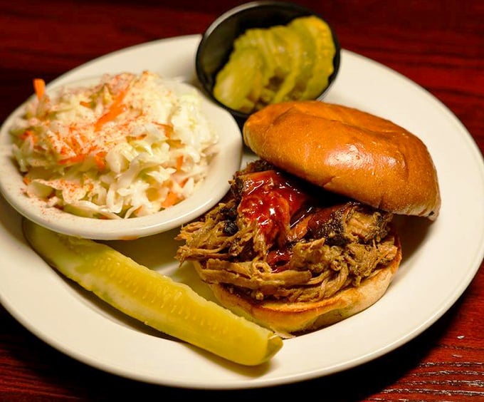This pulled pork sandwich isn't messing around&mdash;tender meat that clearly took its sweet time becoming this delicious, with slaw for that perfect textural counterpoint.