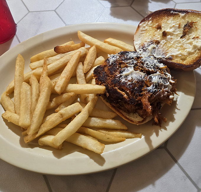 When pulled pork meets toasted bun, angels sing and napkins become absolutely essential equipment.