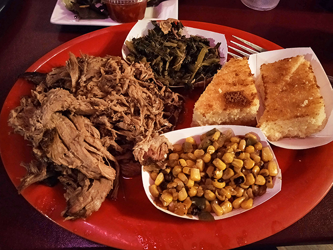 Pulled pork that actually looks hand-pulled, not machine-shredded, alongside collard greens, cornbread, and corn&mdash;a Southern quartet playing in perfect harmony.
