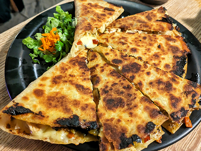Golden quesadilla perfection that makes you wonder why anyone settles for sad chain restaurant versions of this masterpiece.