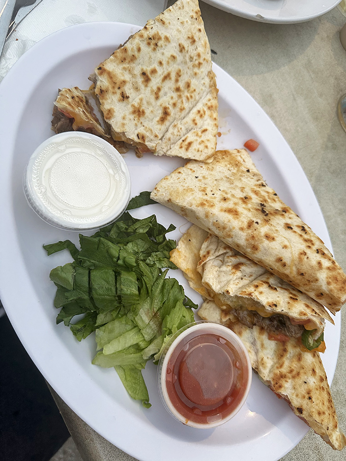 A quesadilla that doesn't skimp on the good stuff &ndash; where cheese meets tortilla in a relationship that was clearly meant to be.
