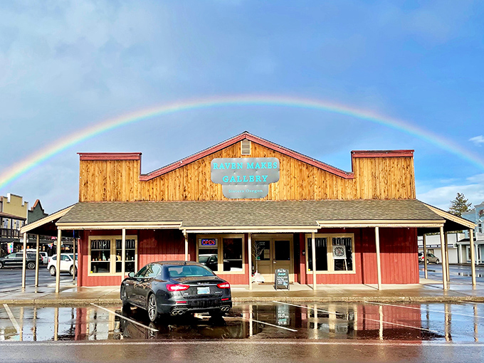 Raven Makes Gallery under a perfect rainbow&mdash;even the weather coordinates with the town's aesthetic. Talk about commitment to the visitor experience!