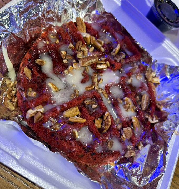 A red velvet waffle topped with pecans and drizzled with sweetness&mdash;proof that Krustaceans understands the importance of a proper seafood chaser.