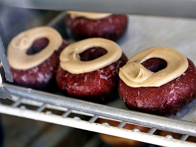 Red velvet donuts with cream cheese frosting: where cake meets donut in a marriage so perfect it deserves its own reality show.