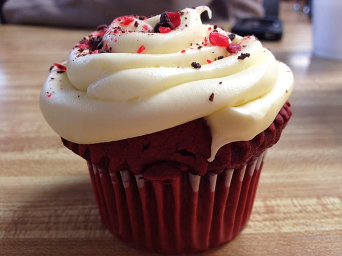Red velvet cupcake with cream cheese frosting that would make your grandmother both proud and jealous. Sweet architecture at its finest.