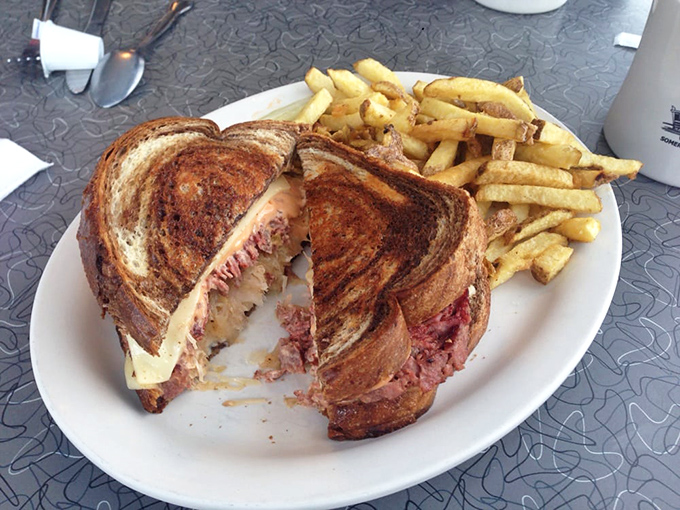 The Reuben sandwich that could broker peace treaties - corned beef, sauerkraut, and Swiss in perfect diplomatic harmony.