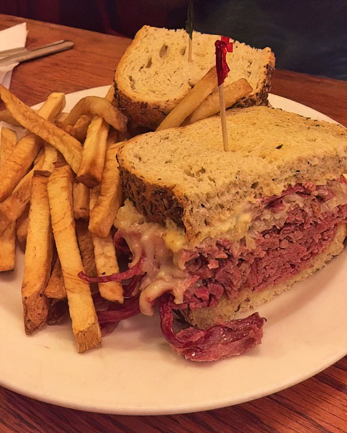 The Reuben that launched a thousand food comas&mdash;melty cheese cascading over corned beef with fries standing by for backup satisfaction.