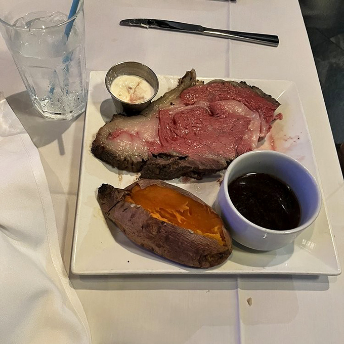 Sometimes even in seafood paradise, you crave a perfectly cooked ribeye. This one, with its sweet potato sidekick, makes no apologies for its land-based origins.