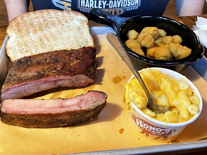 Ribs with that perfect pink smoke ring, mac and cheese that's unapologetically yellow, and okra that's been properly introduced to hot oil.