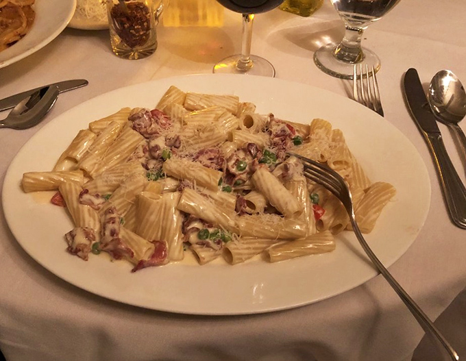 Rigatoni Carbonara that would make a Roman nod in approval. Those tubes of pasta are like little flavor submarines delivering creamy, bacony goodness.
