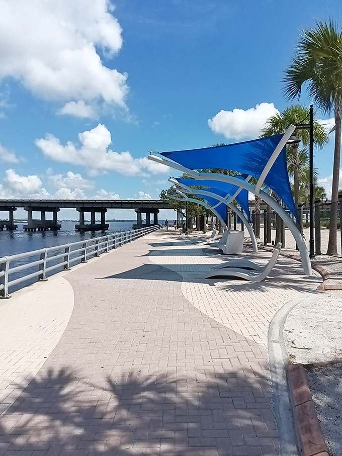 Bradenton's Riverwalk offers shaded respite from the Florida sun. Those blue sail structures are architectural showoffs&mdash;and we're grateful for it.
