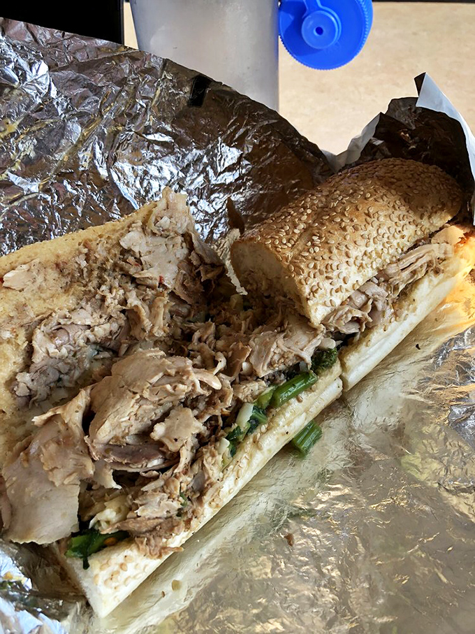 The Roast Pork Supremo: where tender pork meets bitter greens in a flavor combination so perfect it should have its own national holiday.