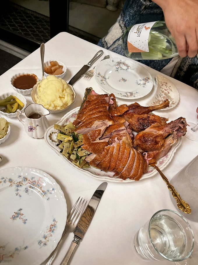 Duck so perfectly roasted it should have its own Instagram account. The sliced breast fans out like a deck of cards dealt by a chef who knows exactly how to play the game.