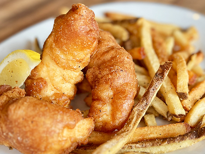 Golden-battered rockfish that shatters with each bite, paired with fries that could make a Frenchman weep with joy.