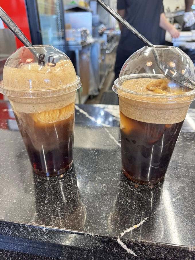 Root beer floats: where childhood nostalgia meets adult appreciation. Two straws might suggest sharing, but I wouldn't risk it.