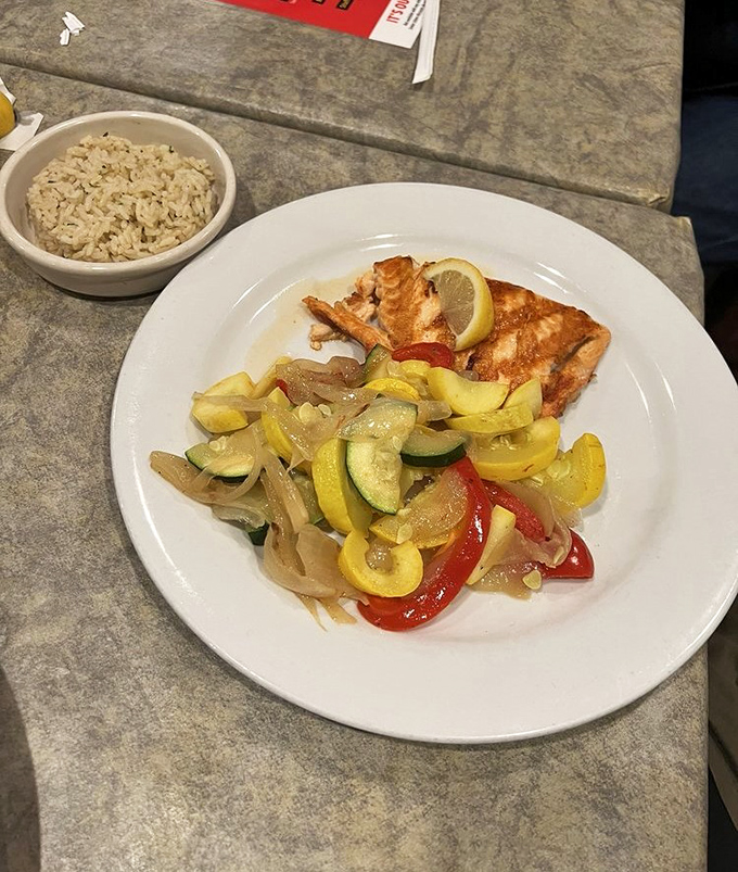 Who says healthy can't be heavenly? This perfectly seared salmon with colorful vegetables proves that virtue and flavor can coexist beautifully.