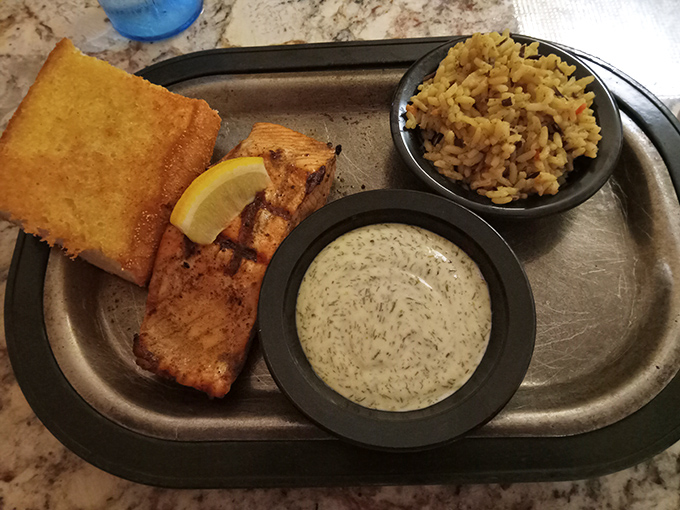 Salmon that looks like it just had a perfect day at the spa – beautifully grilled, perfectly flaked, and ready for its close-up.