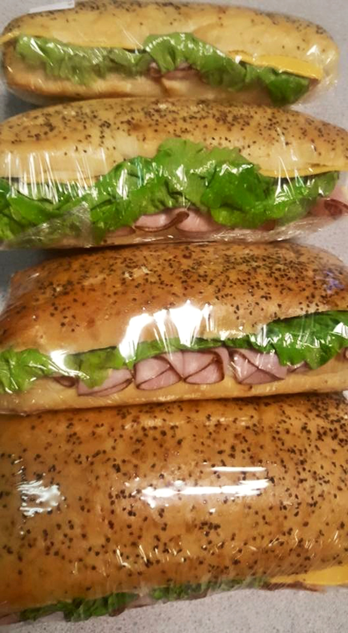 Sandwiches wrapped with care, like edible presents waiting to be unwrapped. These aren't just lunch—they're portable happiness on homemade bread.